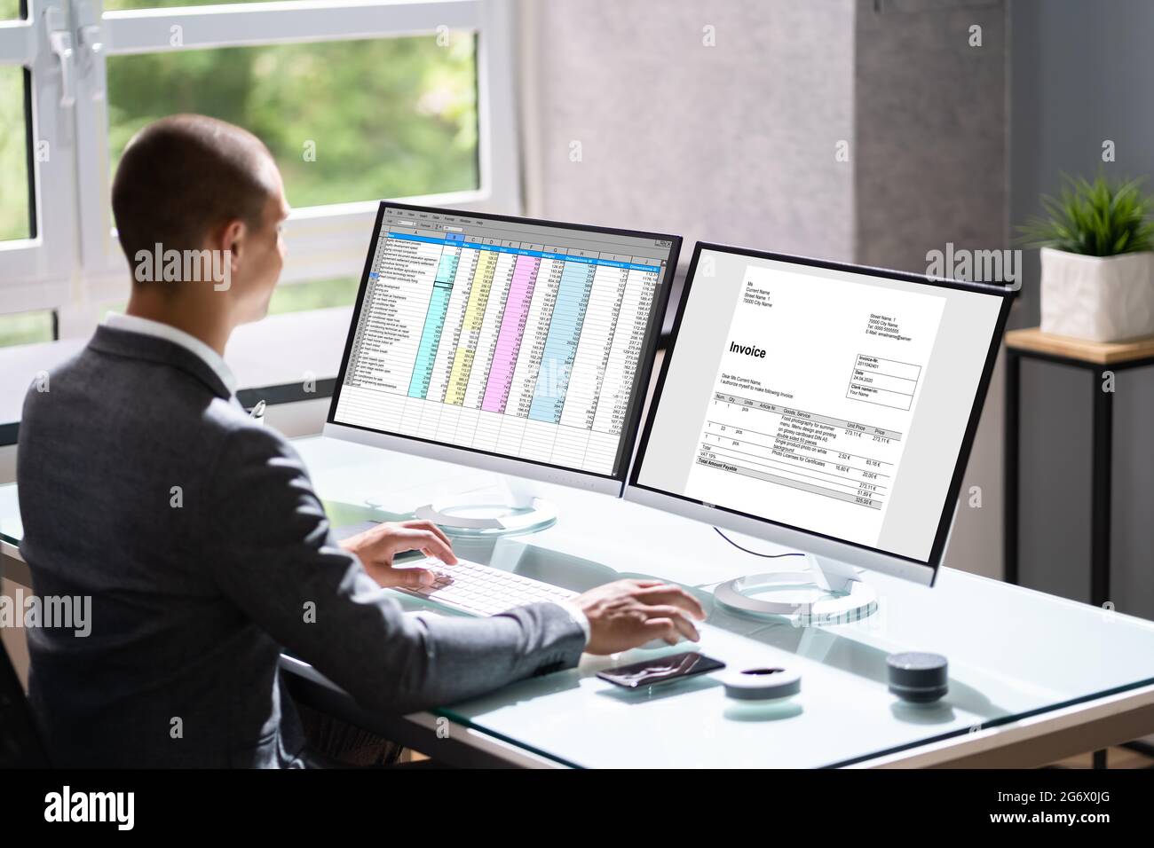 Male office manager using hi-res stock photography and images - Alamy