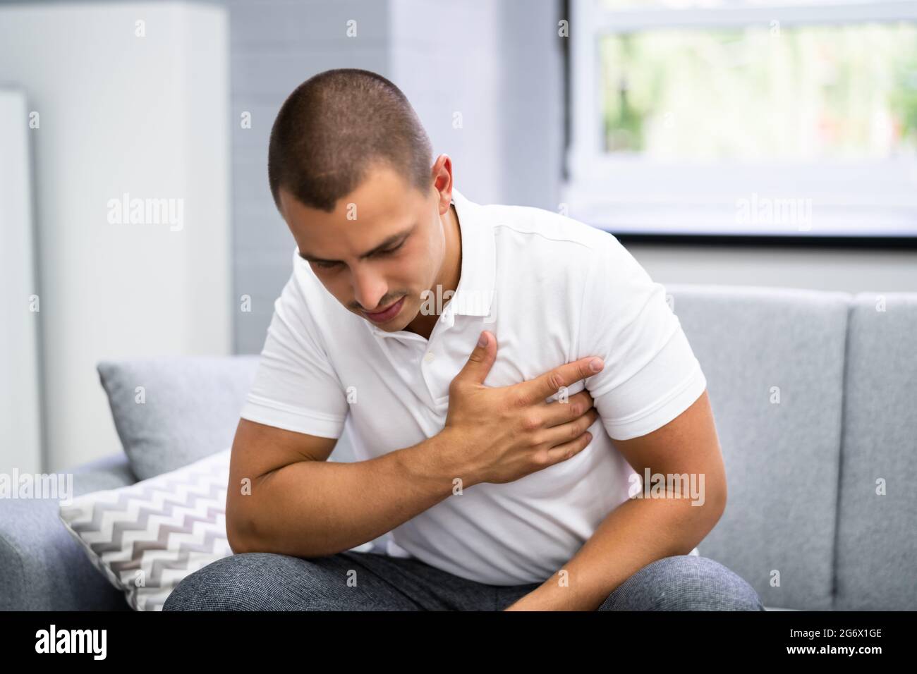 Man Chest Pain. Angina Or Heart Attack Stock Photo - Alamy