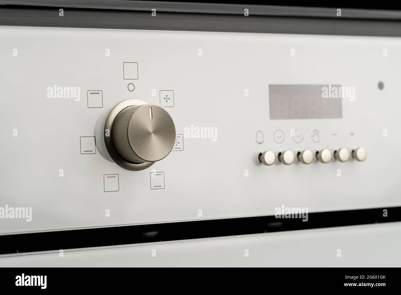 Modern oven mode control button close up Stock Photo - Alamy