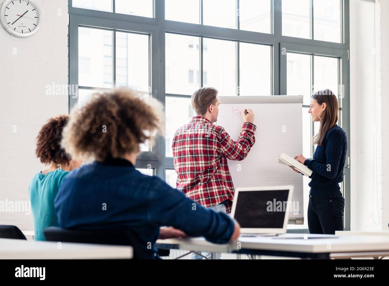 Student presenting in a classroom hi-res stock photography and images ...