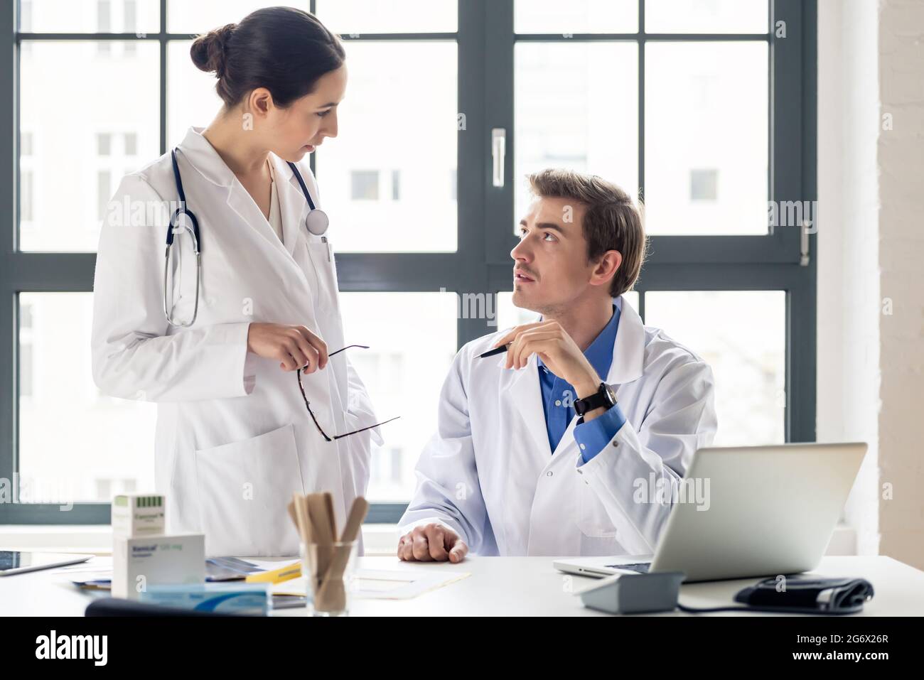 Asking experienced colleague hi-res stock photography and images - Alamy