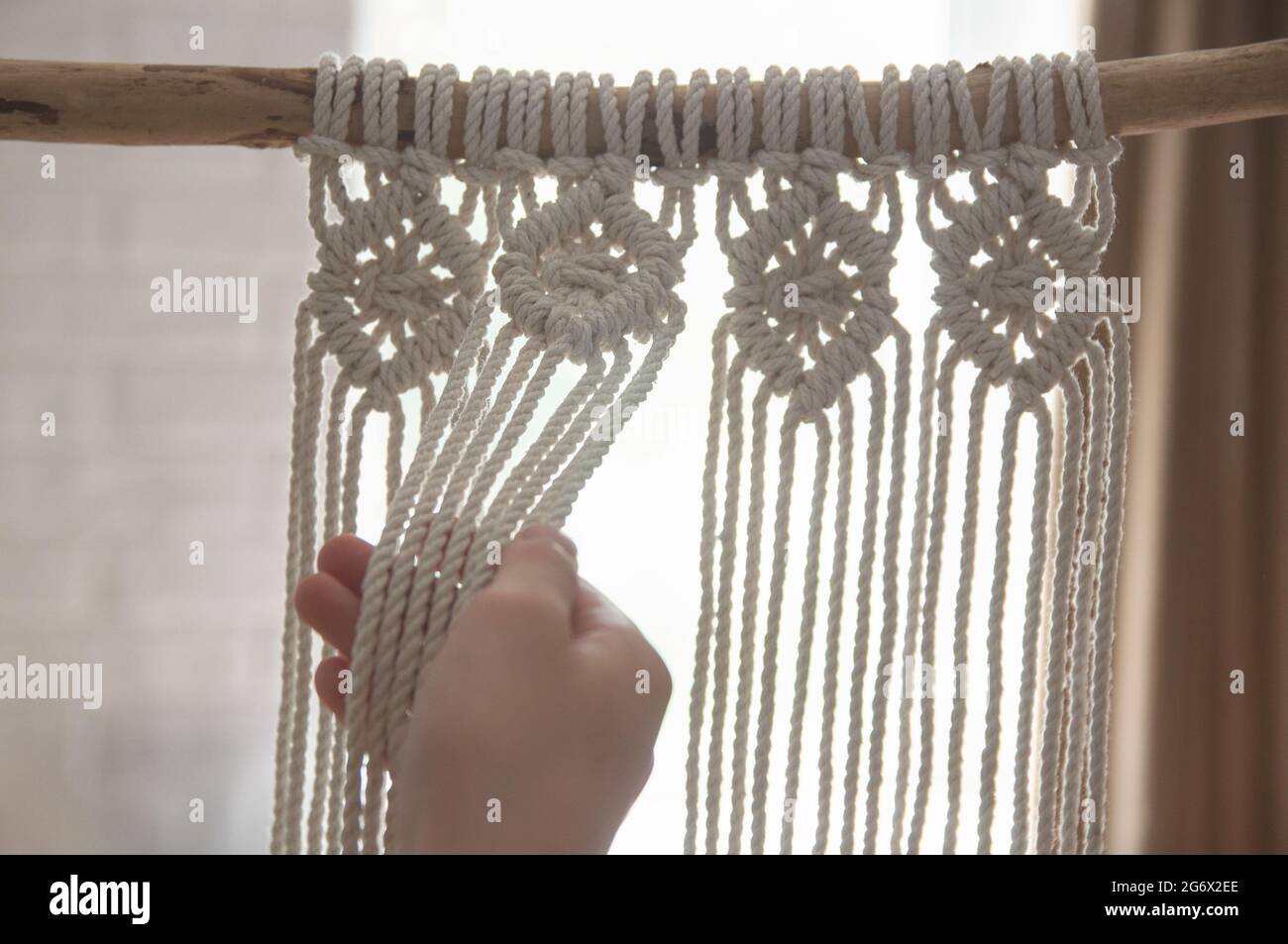 Boho wall mural made of natural color cotton threads using macrame ...