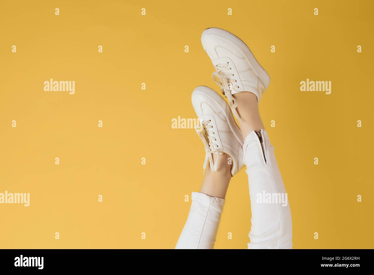 inverted female feet shoes fashion modern style Stock Photo - Alamy