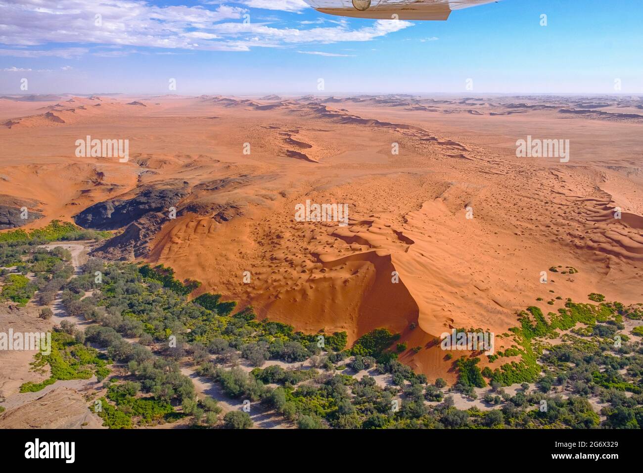 Skeleton Coast aerial photo of green Kuiseb River canyon flows along ...