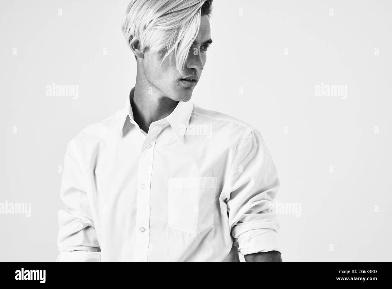 man in white shirt fashionable hairstyle modern style manager office ...