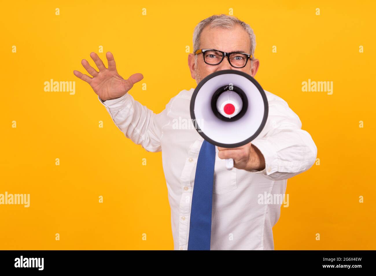 isolated businessman shouting into megaphone Stock Photo - Alamy