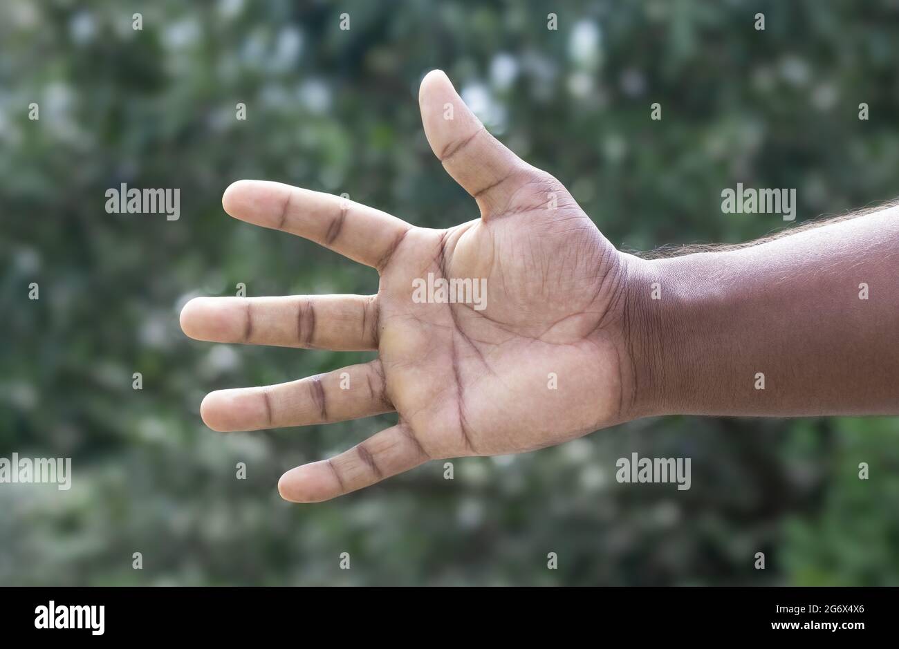 Stretching hand hi-res stock photography and images - Alamy