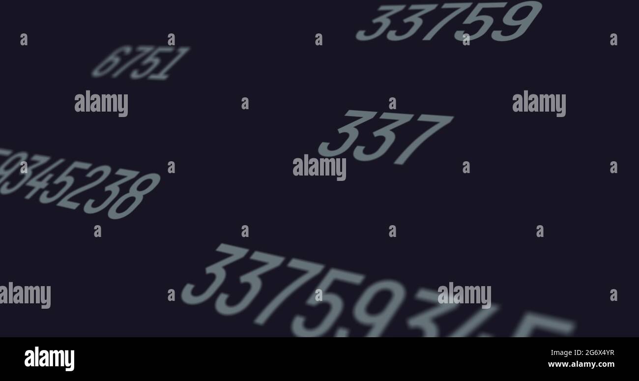 Sets of random numbers with a grey font color projected on a black ...