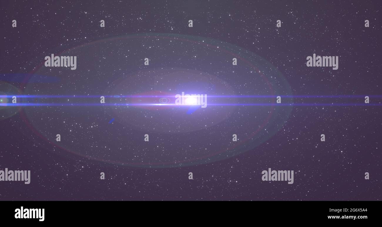 Bright blue spot of light glowing in the night sky Stock Photo - Alamy