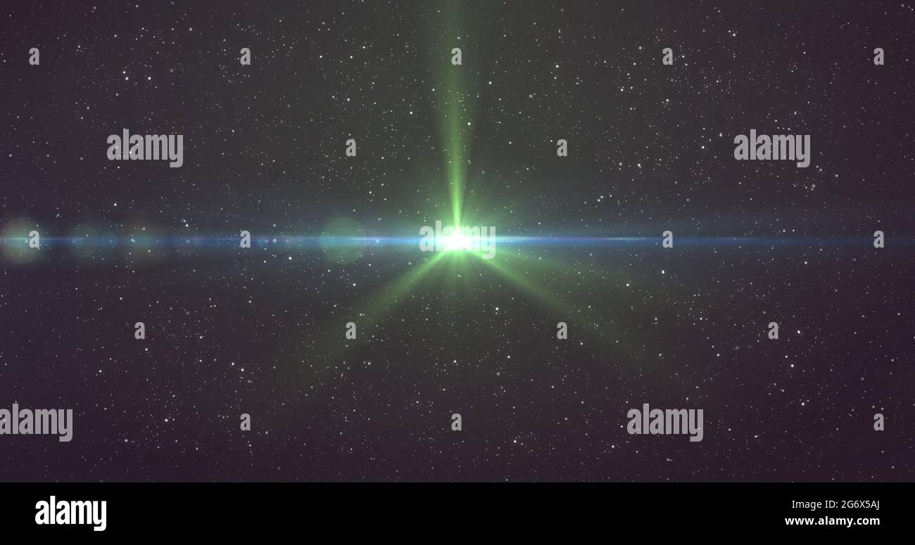 Green star light glowing in the night sky Stock Photo - Alamy