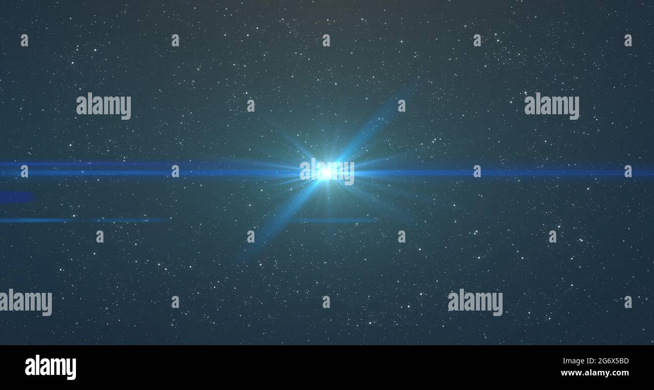 Bright blue spot of light glowing in the night sky Stock Photo - Alamy