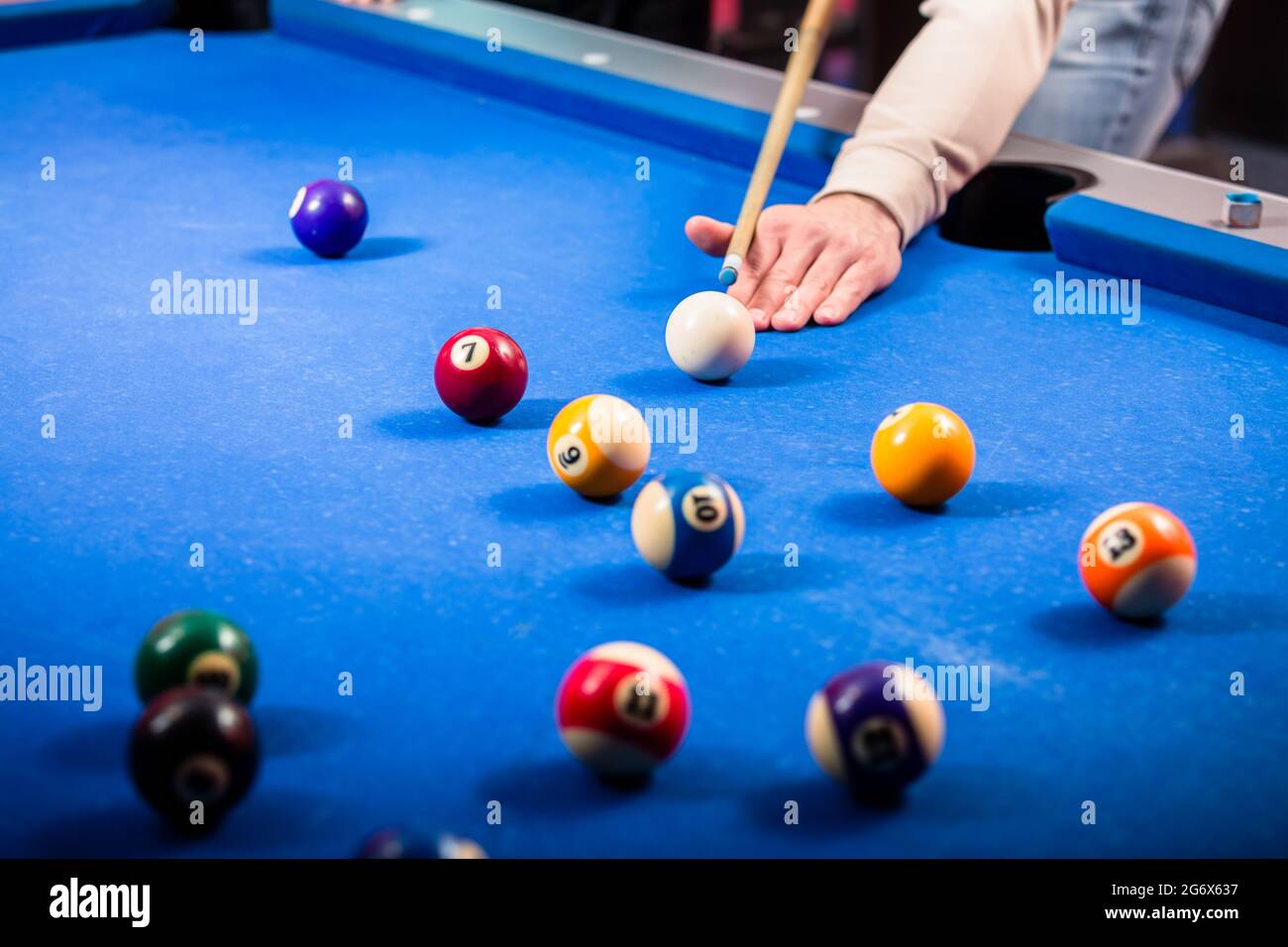 Close-up of a man's hand playing pool Stock Photo - Alamy