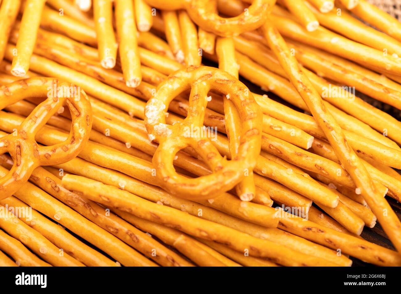 Bread sticks and bread figures with salt. Close-up Background image ...