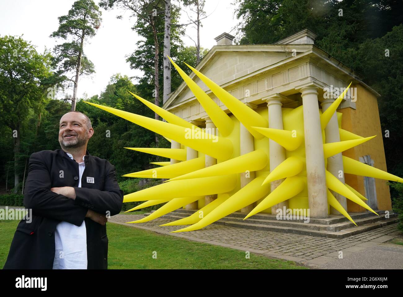 Artist Steve Messam stands next to his artwork, Spiked, an inflatable ...