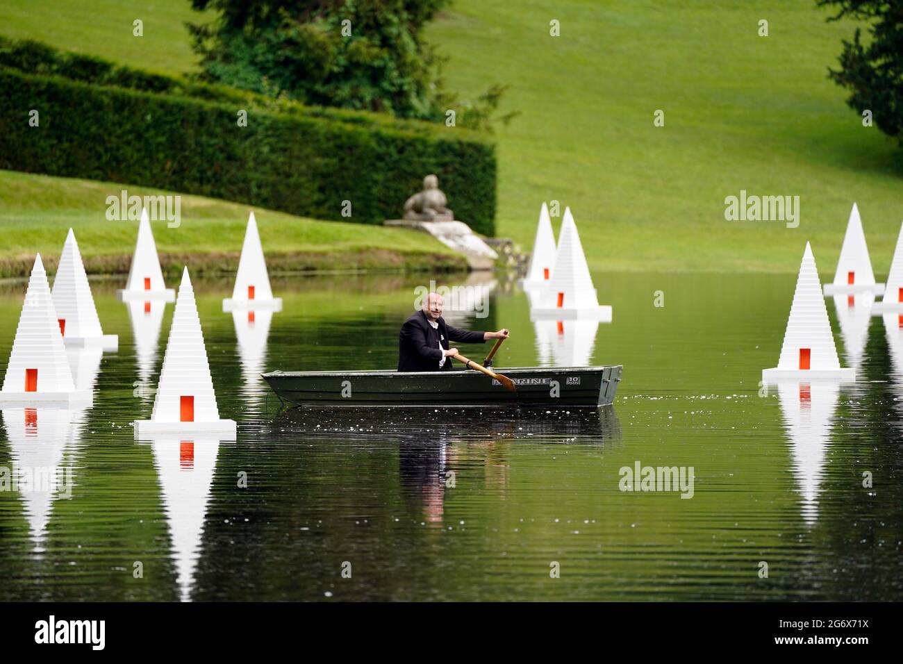 Artist Steve Messam rows a boat amongst his artwork, Drifted - 12 ...