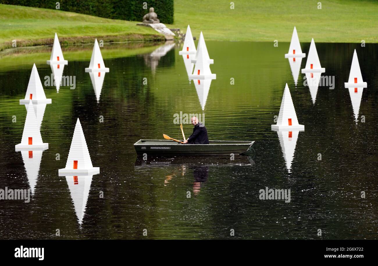 Artist Steve Messam rows a boat amongst his artwork, Drifted - 12 ...