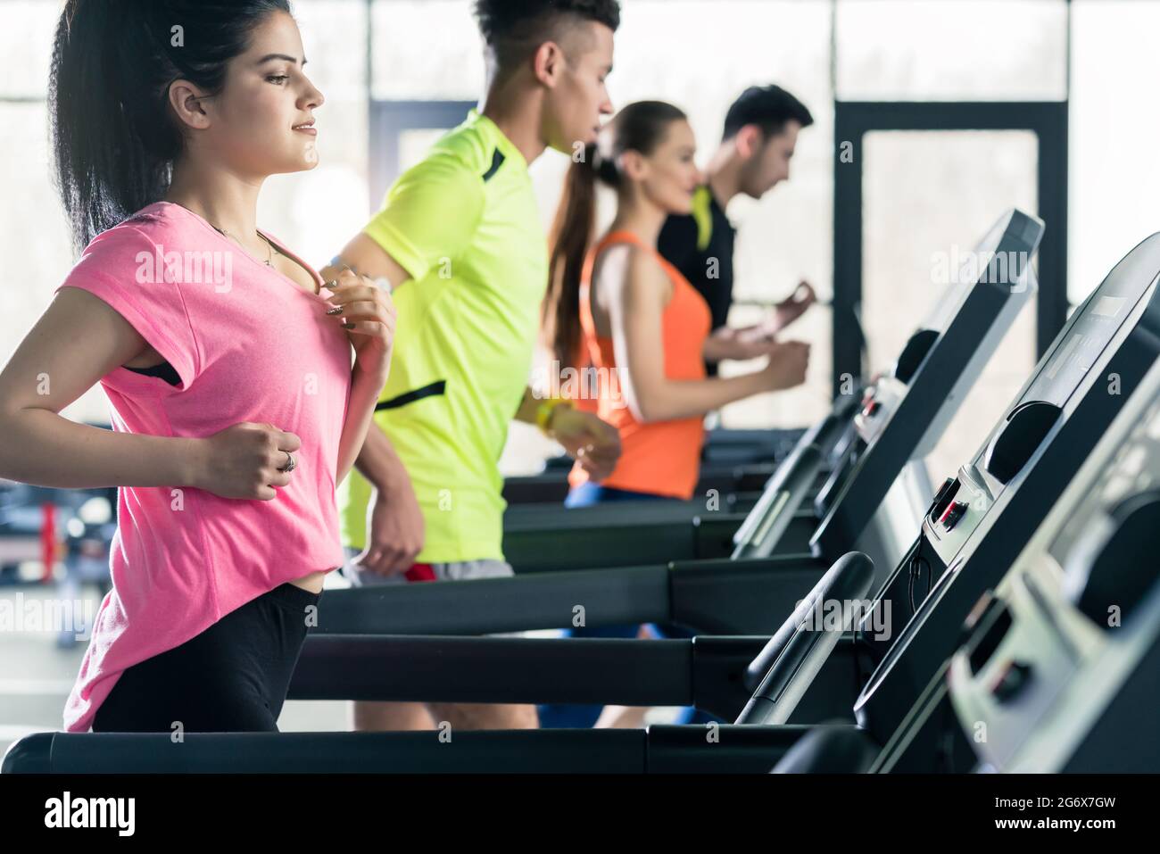 Young attractive female treadmill runner hi-res stock photography and ...