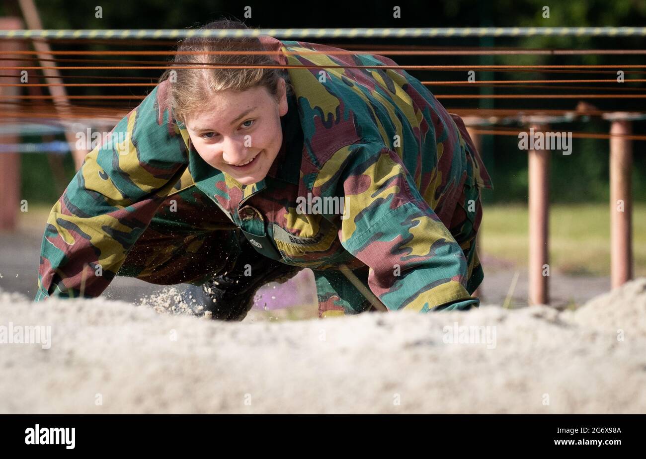 Crown Princess Elisabeth takes part in an obstacle course during a ...
