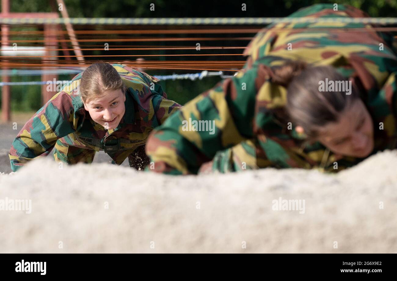 Crown Princess Elisabeth takes part in an obstacle course during a ...