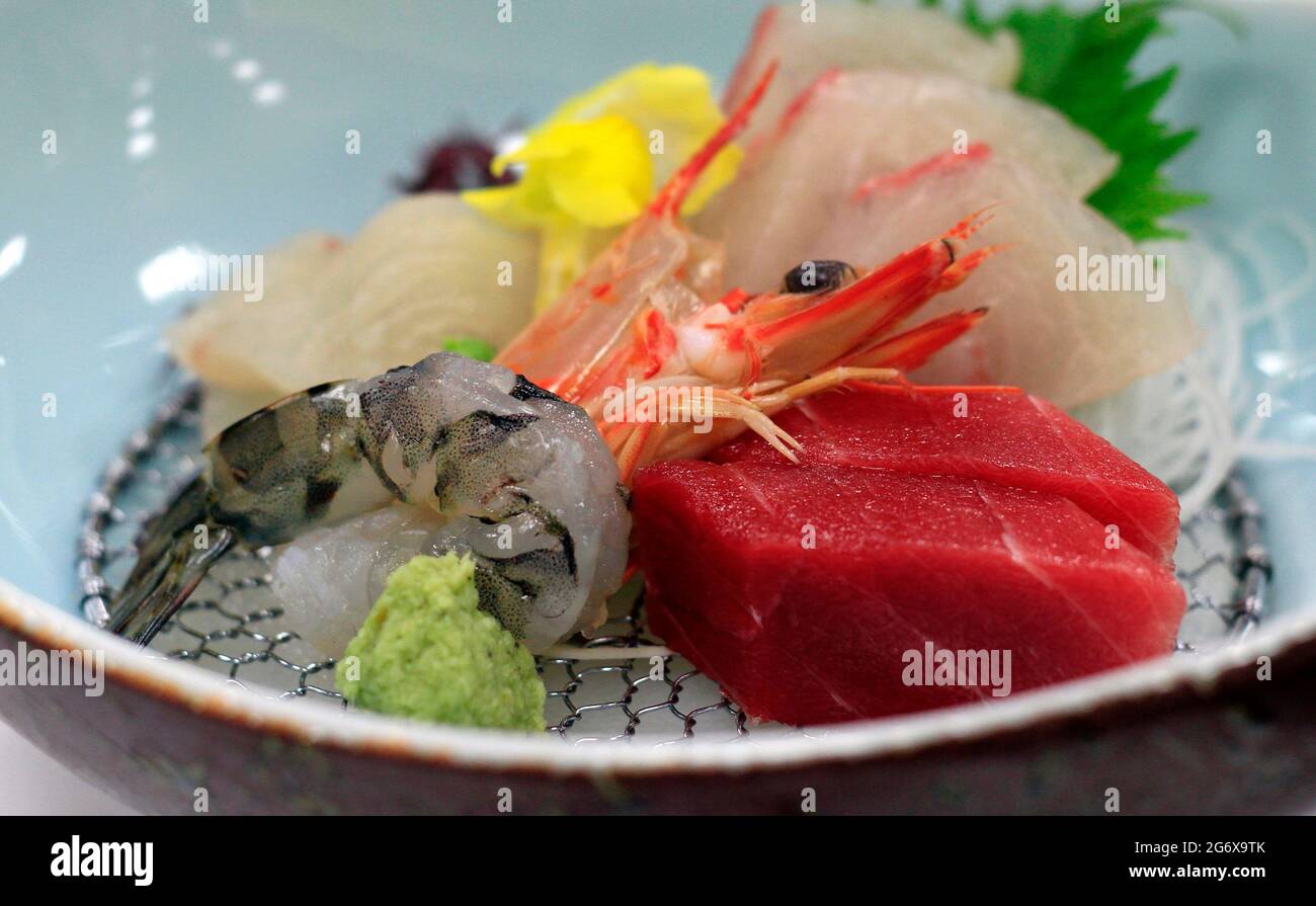 Delicious bowl of Sashimi in Japan Stock Photo - Alamy