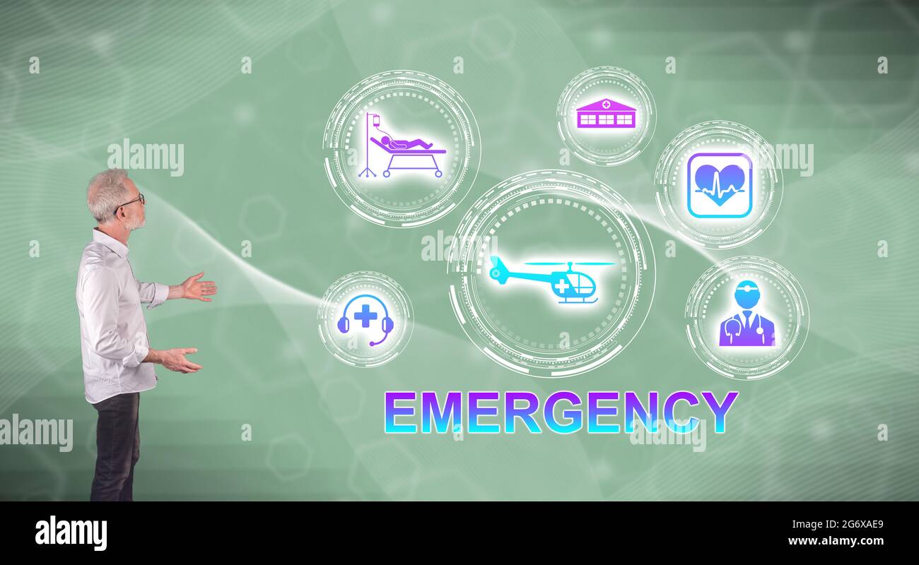 Businessman showing an emergency concept on a wall screen Stock Photo ...