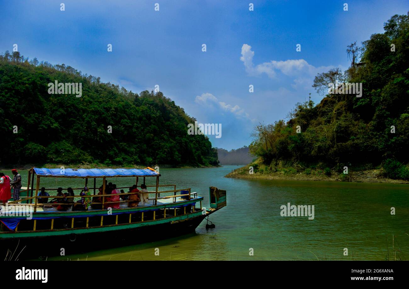 Boat at kaptai lake with beautiful hill landscape Stock Photo - Alamy