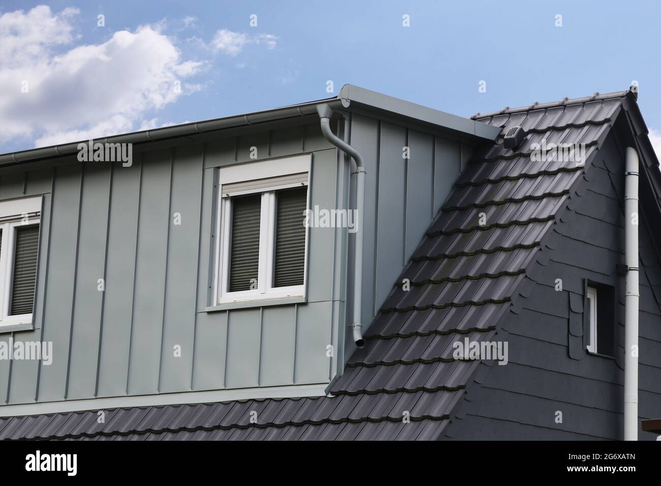 Roof dormer with stainless steel cladding Stock Photo - Alamy