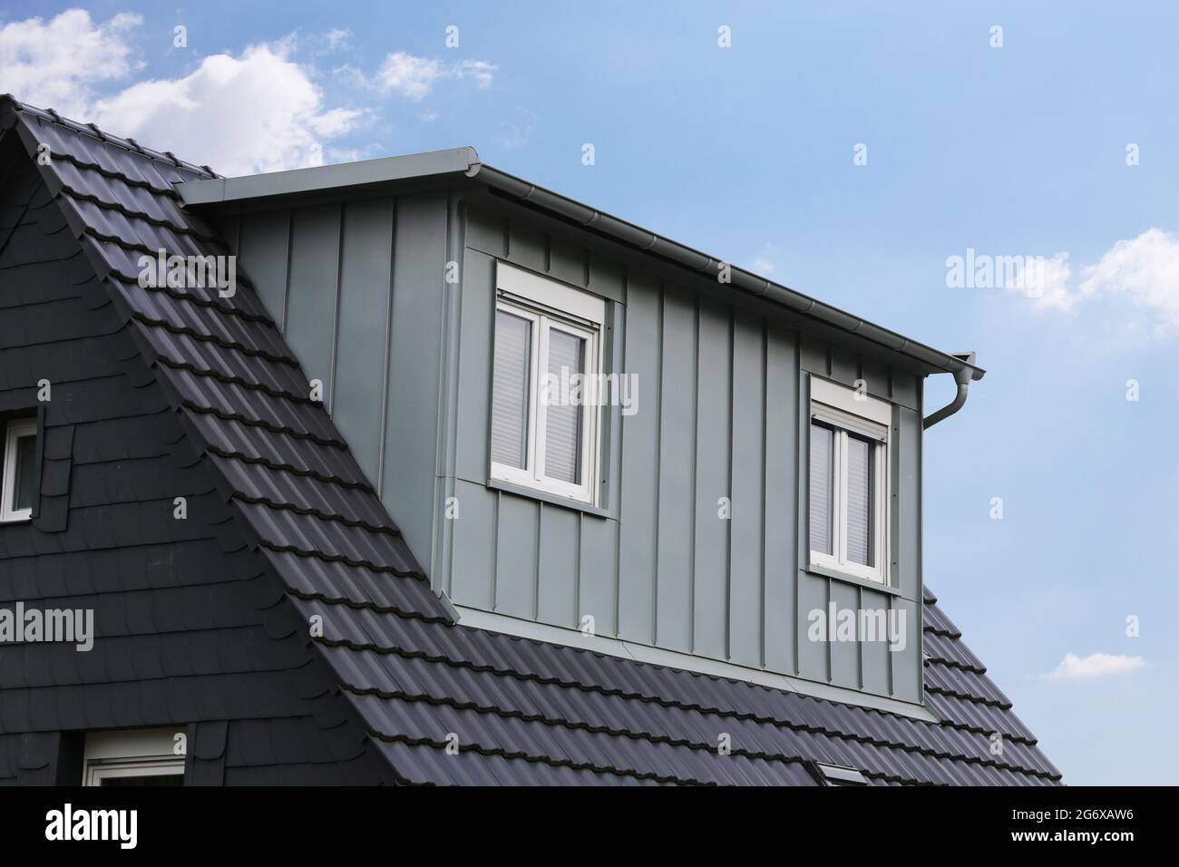 Roof dormer with stainless steel cladding Stock Photo - Alamy