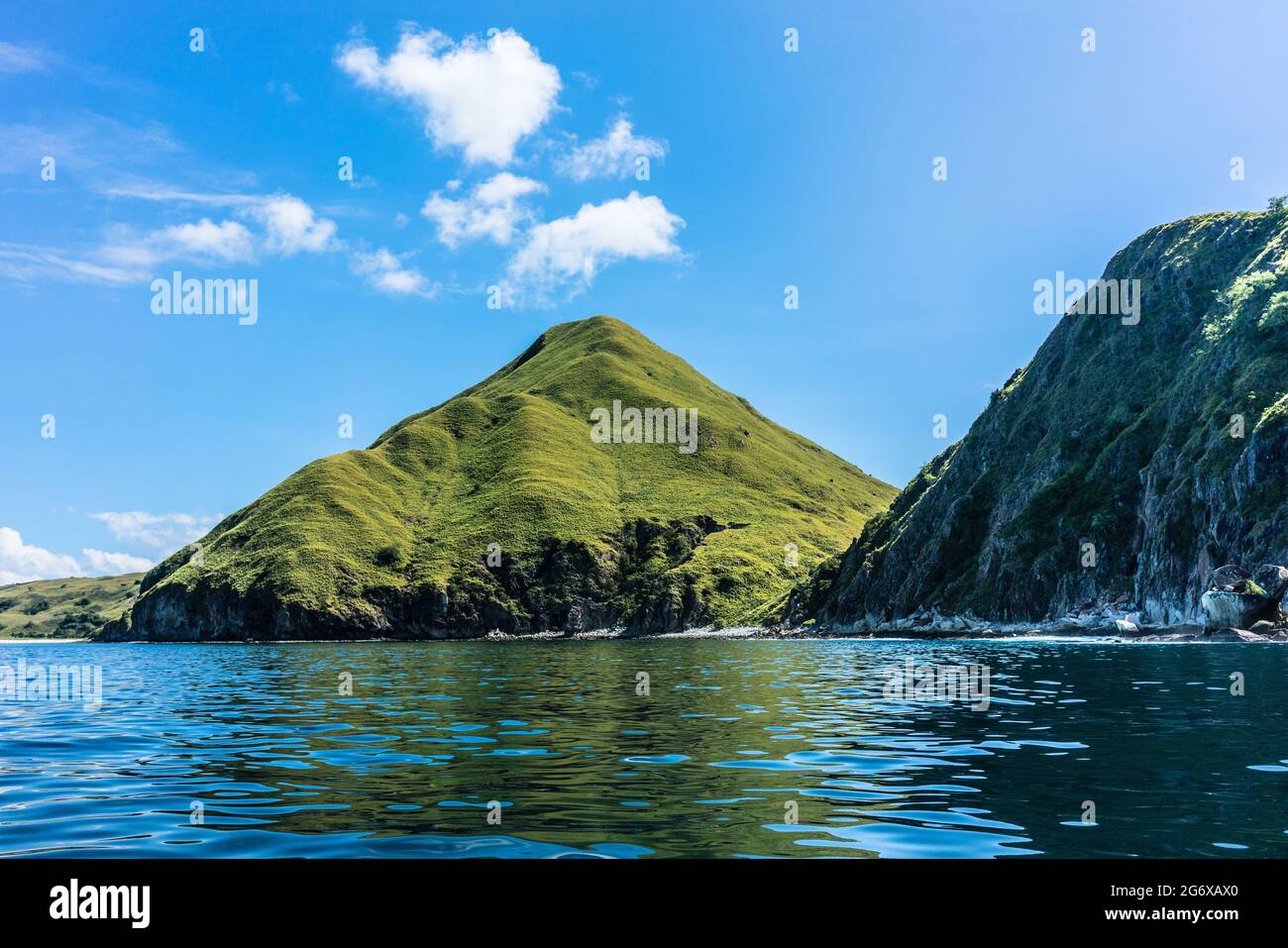 Idyllic seascape from Indonesia with the rock formations of Padar ...
