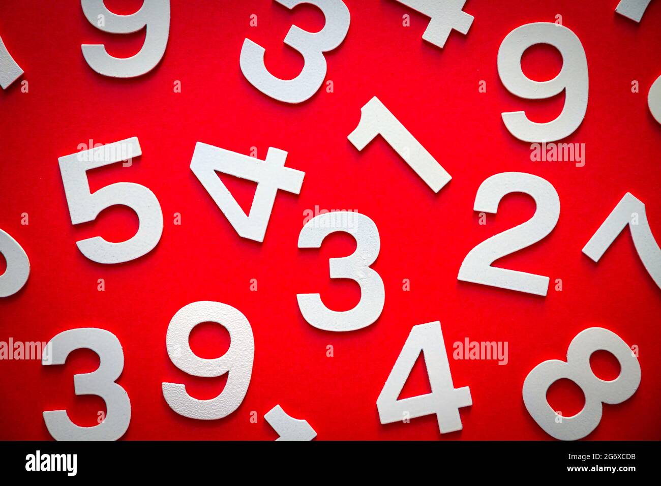 Mathematics background made with solid numbers on a board. Top view ...