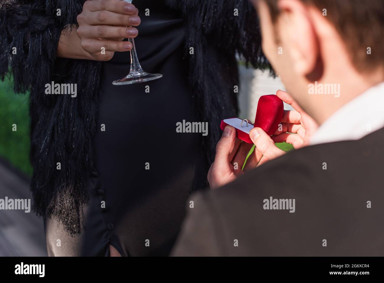 partial view of man making proposal to woman outdoors Stock Photo - Alamy
