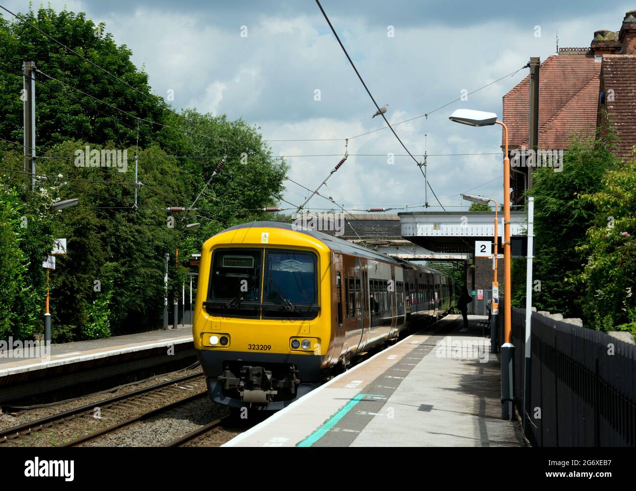 A West Midlands Railway class 323 electric train at Shenstone railway ...