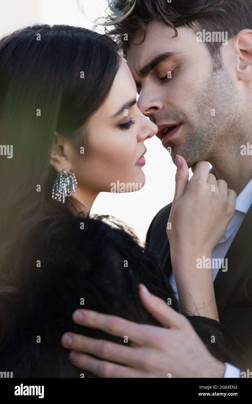 Woman touch chin hi-res stock photography and images - Alamy