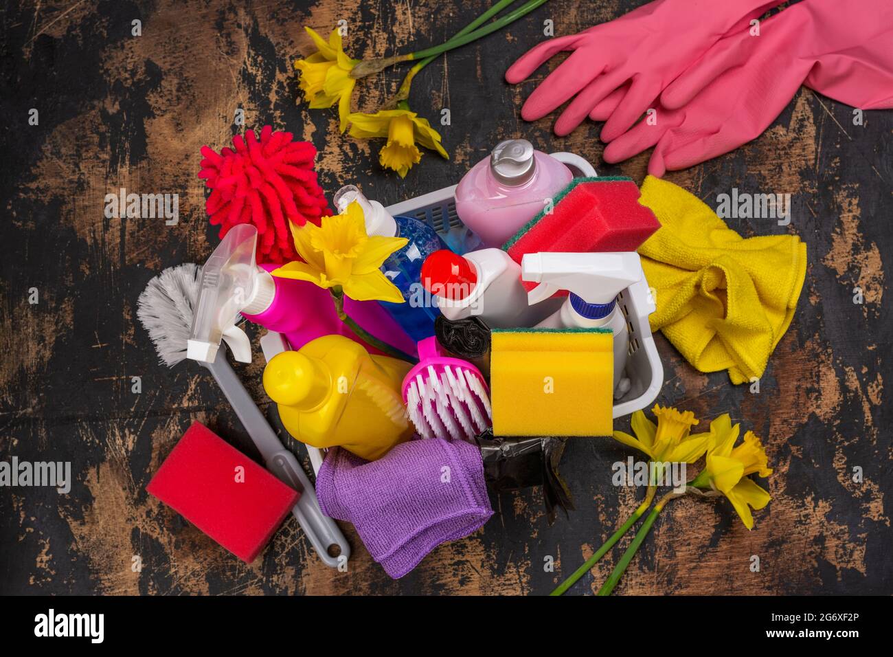 Spring cleaning office or house concept. Different cleaning supplies ...