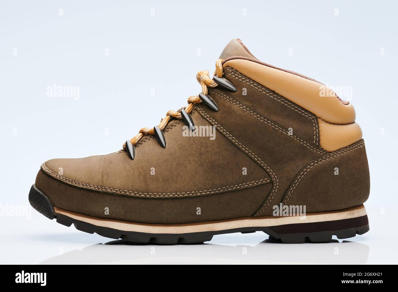 Brown hiking boot side view isolated on white background Stock Photo ...