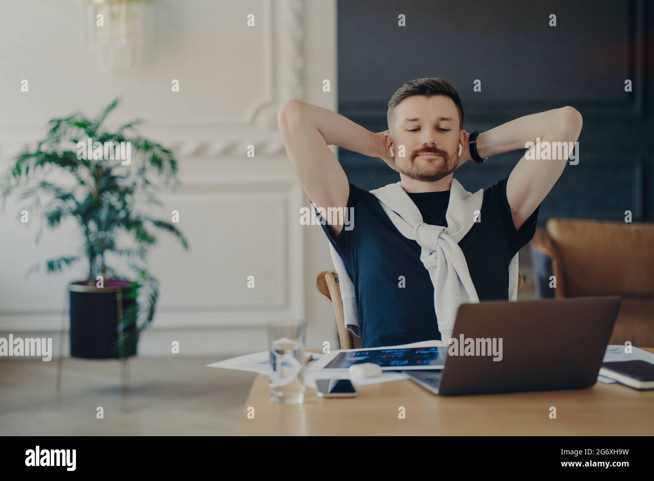 Businessman relaxing at home hi-res stock photography and images - Alamy