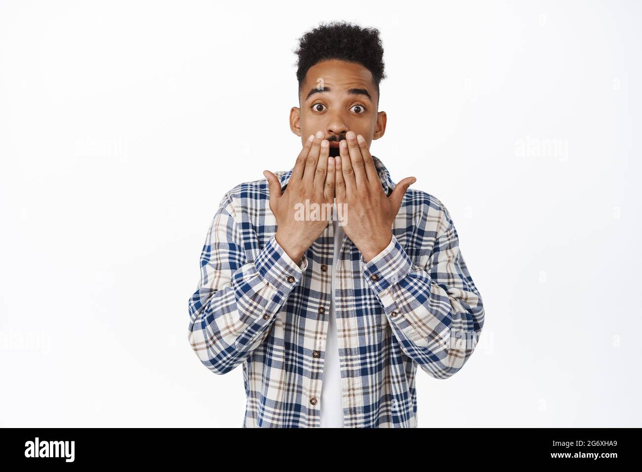 Hand covering mouth gasping hi-res stock photography and images - Alamy