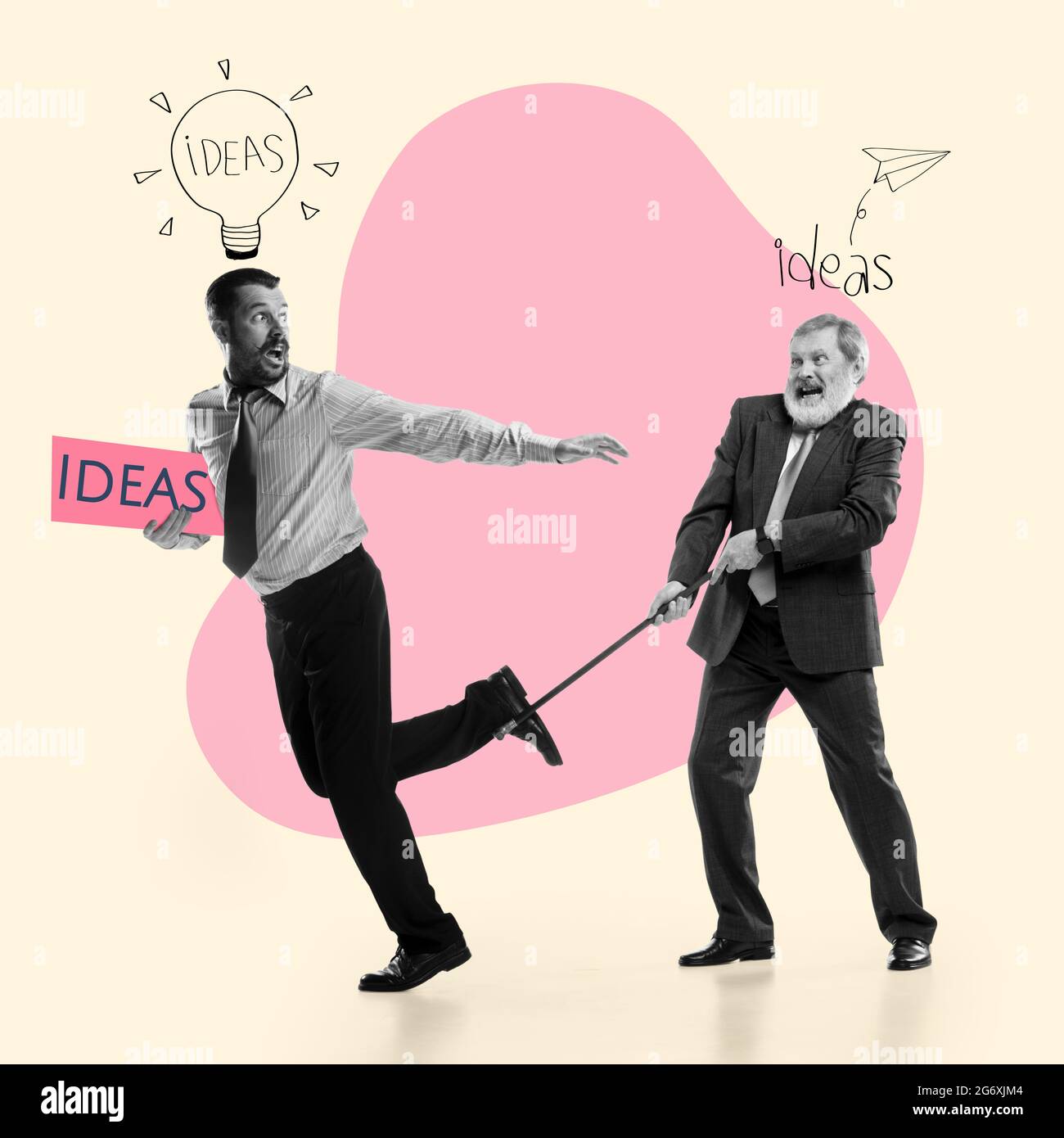 Stealing ideas. Images of two business men one holding another with ...