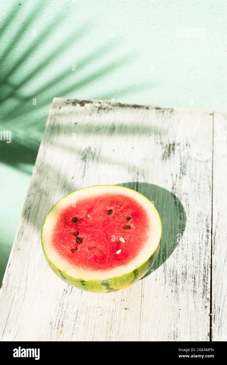 Watermelon, tropical fruit on a bright background, modern minimalist ...