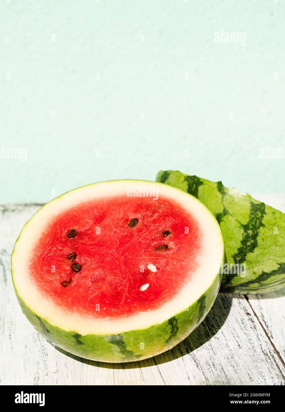 Watermelon, tropical fruit on a bright background, modern minimalist ...