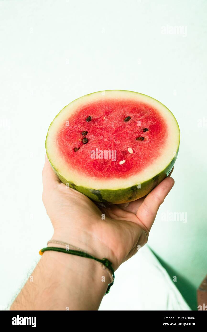 Watermelon, tropical fruit on a bright background, modern minimalist ...