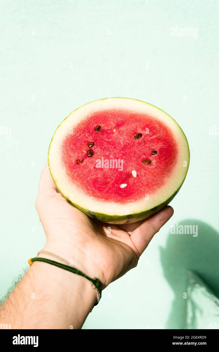 Watermelon, tropical fruit on a bright background, modern minimalist ...