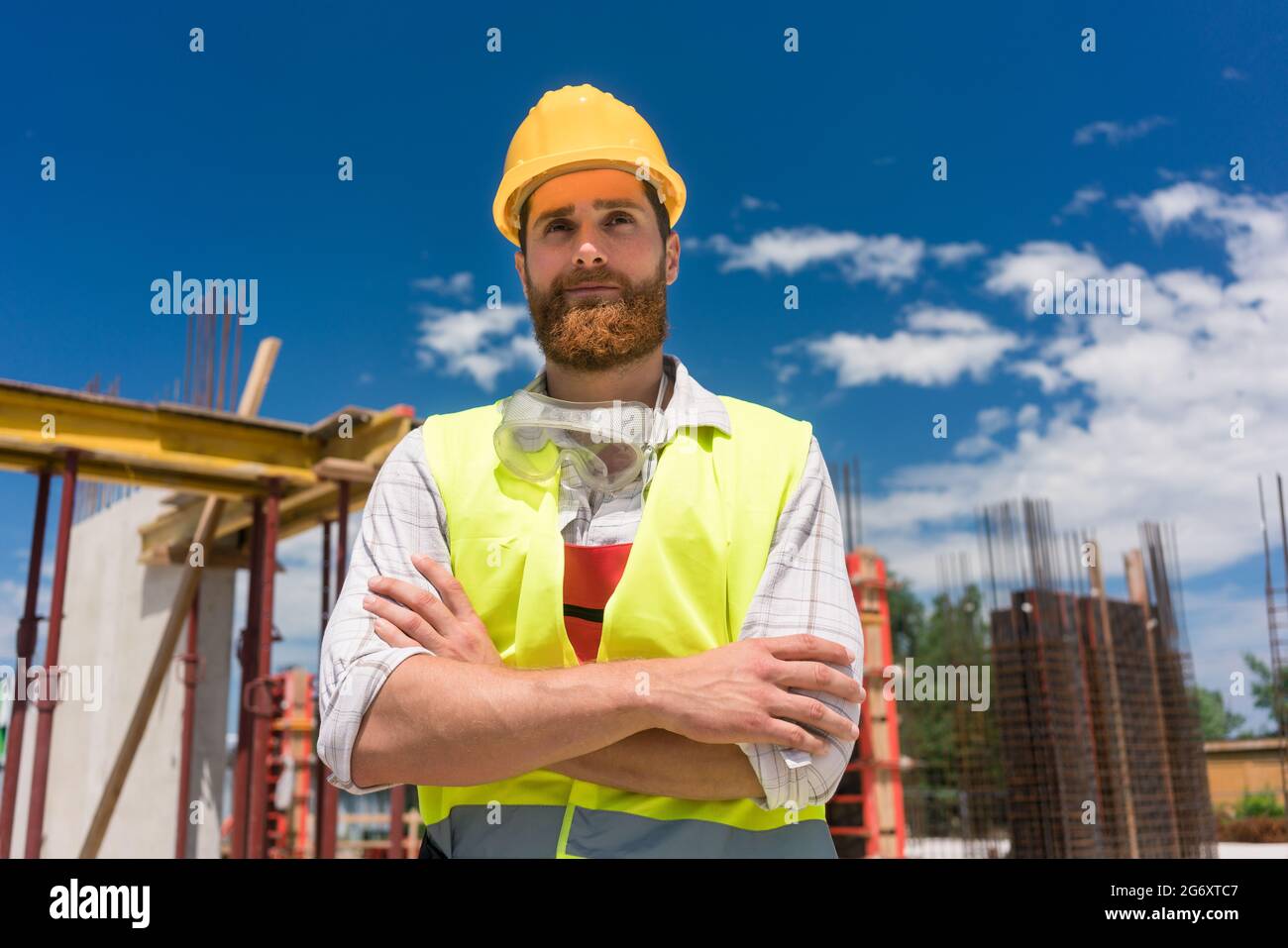 Construction wearing hard hat vest hi-res stock photography and images ...