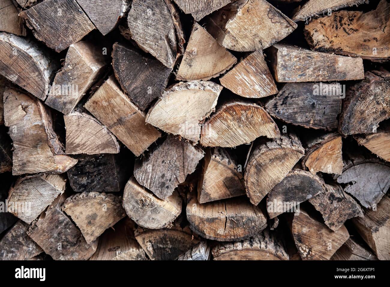 A chopped wood pile background with a well dried mix of hardwood and ...