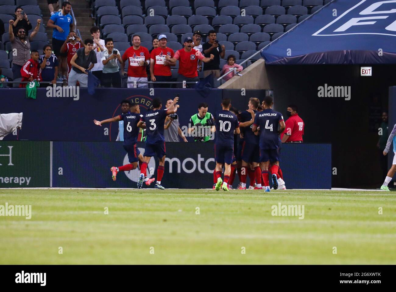 Chicago Fire FC teammates celebrate a goal during a MLS match against ...