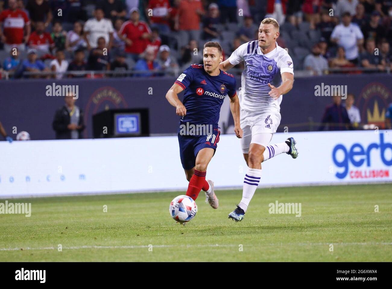Orlando City defender Robin Jansson (6) chases behind Chicago Fire ...