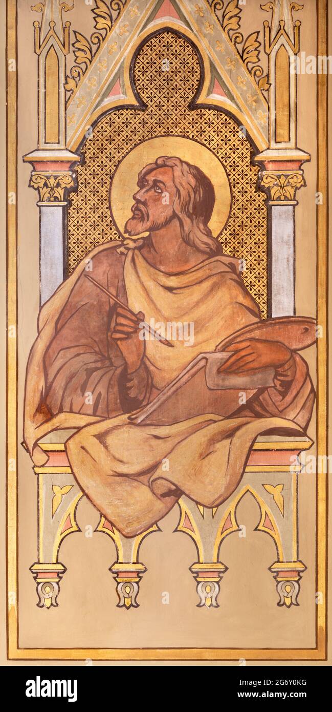 VIENNA, AUSTIRA - JUNI 24, 2021: The fresco of St. Luke the Evangelist in the church ...