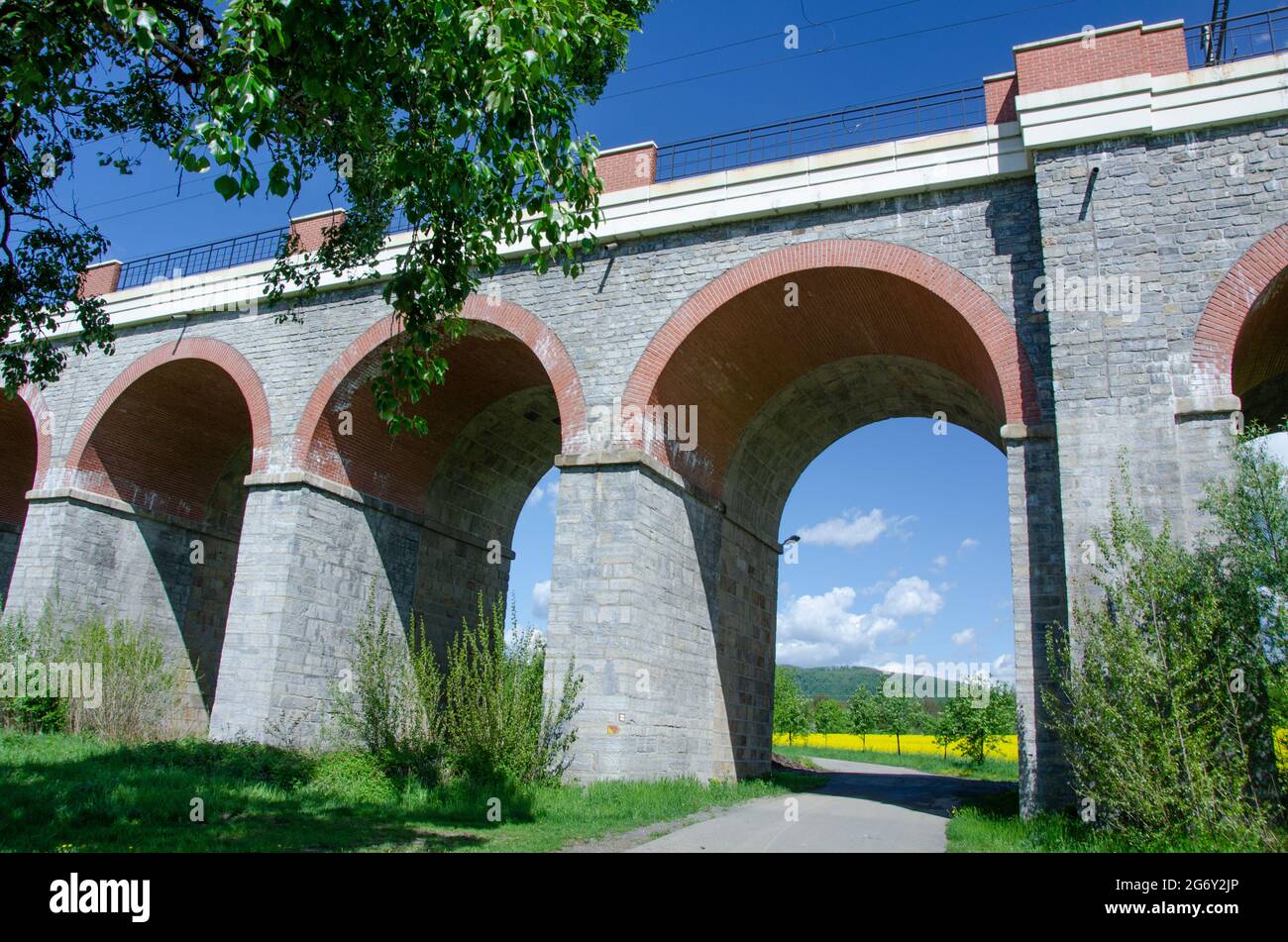 Beautiful scene of viaduct type of bridge surrounded by green fields ...