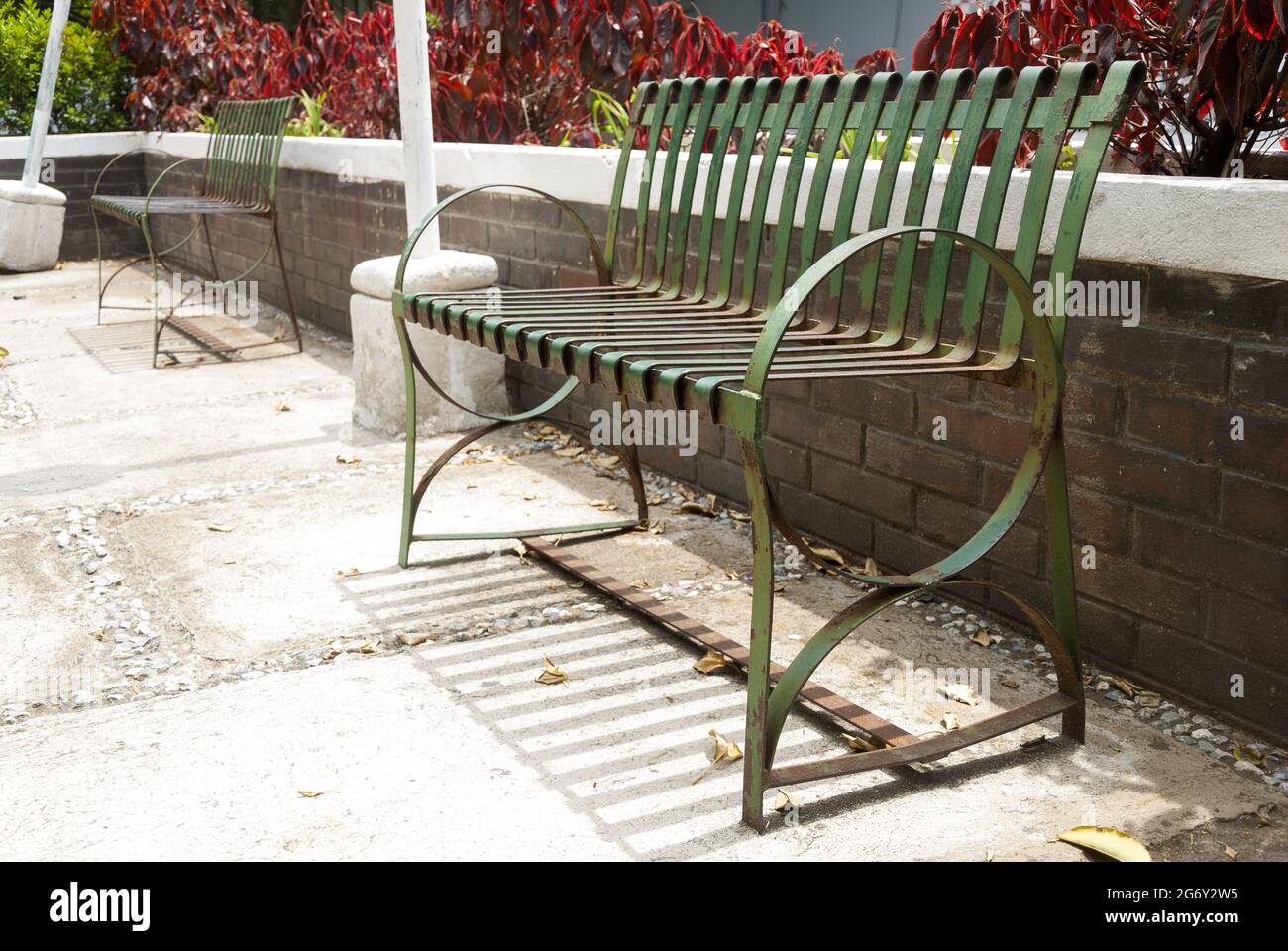 Old metal bench in urban park, municipal outdoor decoration Stock Photo ...