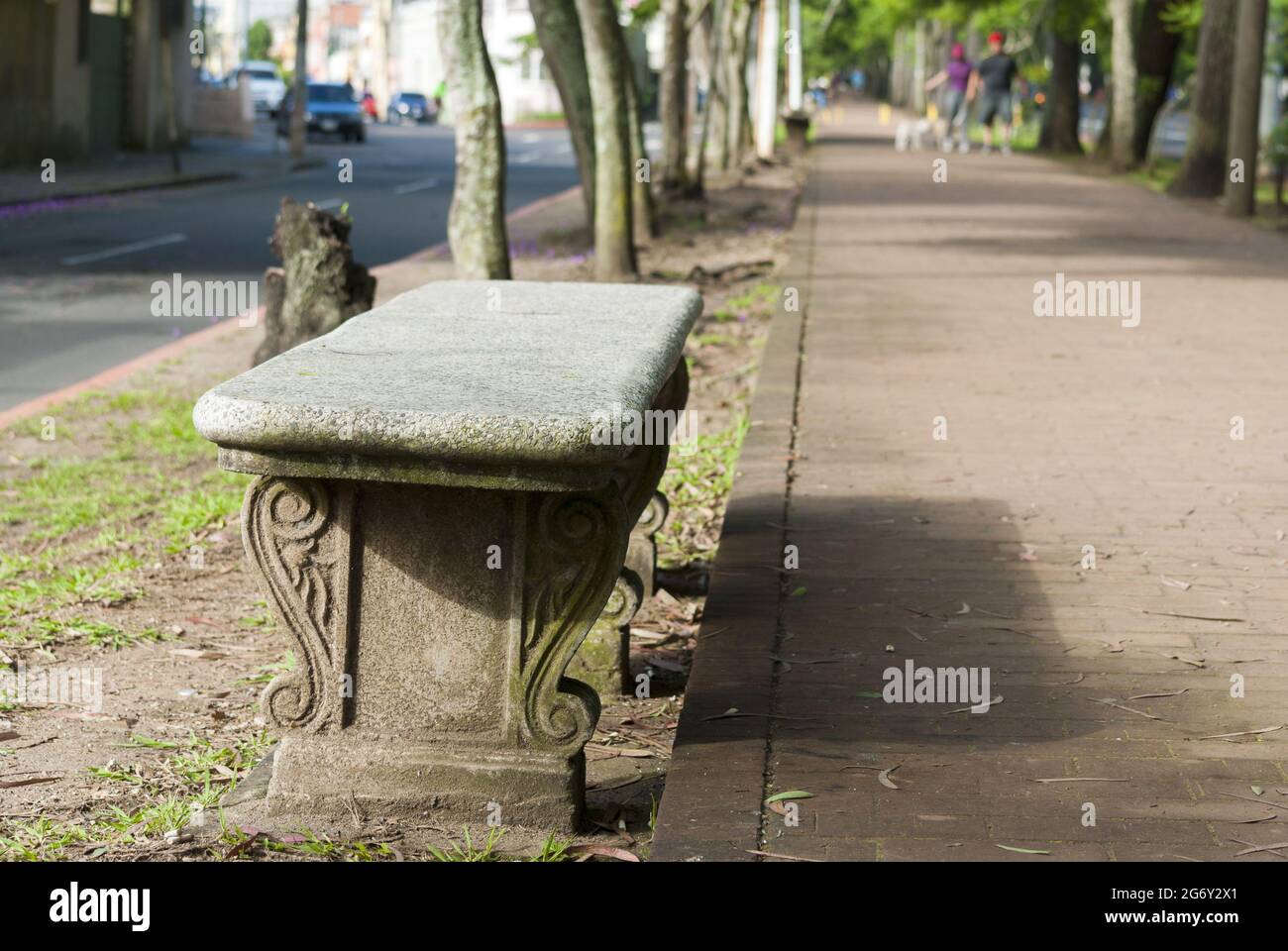 Very old concrete bench on the street of Guatemala City, municipal ...